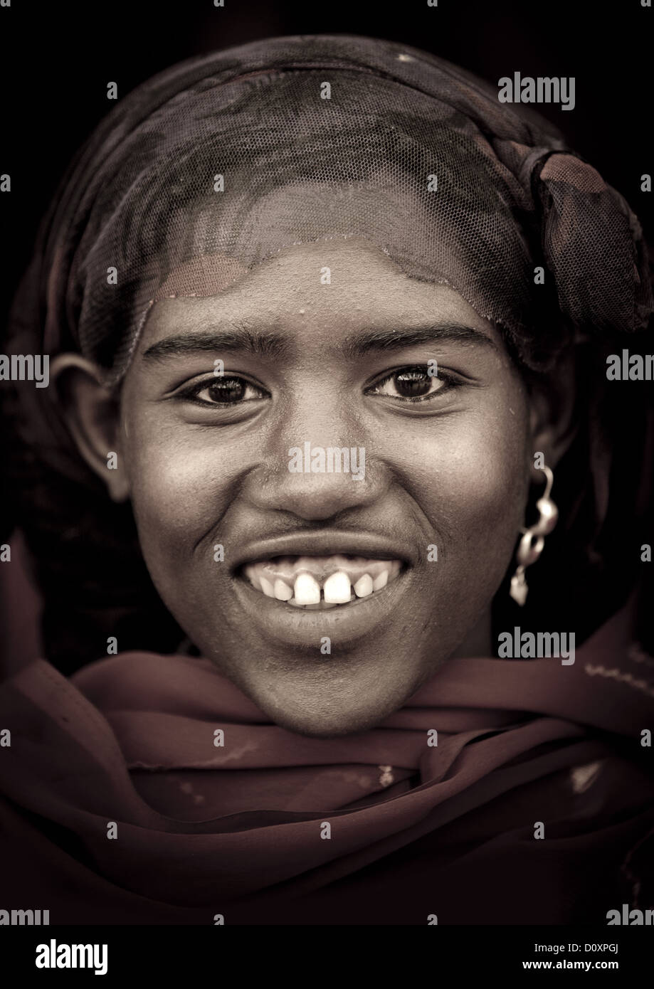 Portrait Of An Oromo Girl With Toothy Smile, Harar, Ethiopia Stock ...