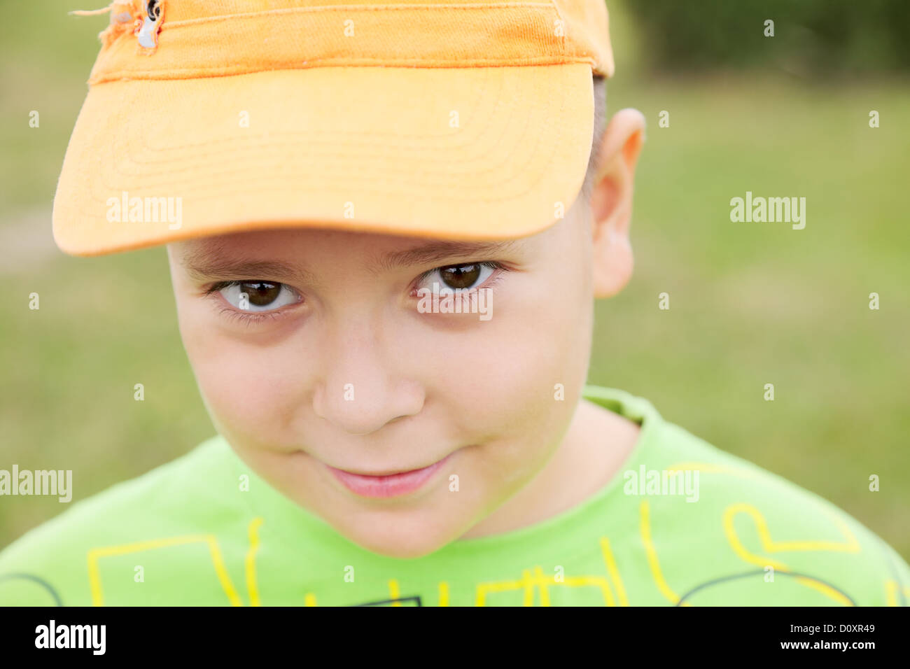 Boy in green cap hi-res stock photography and images - Alamy