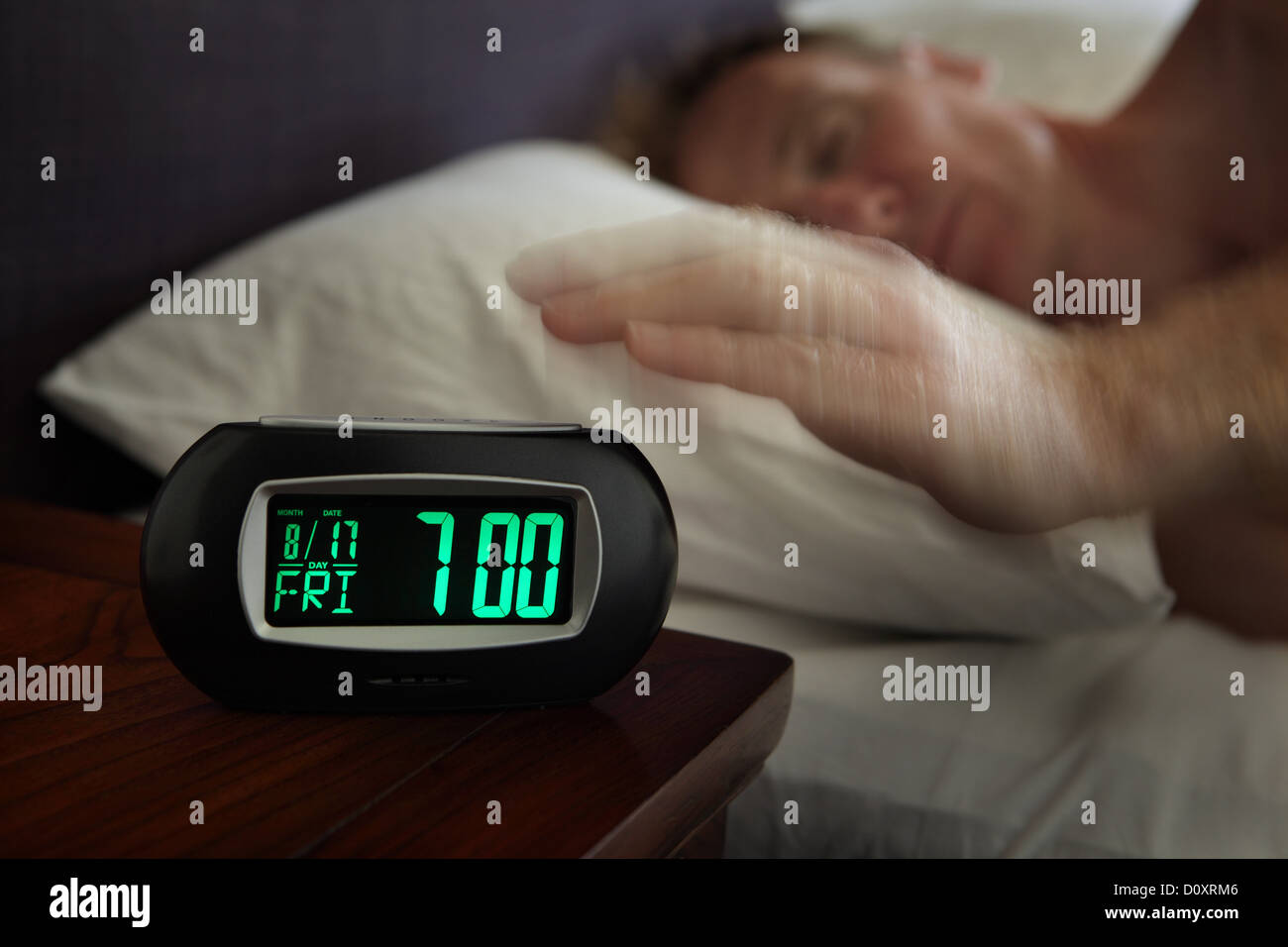 Digital alarm clock by bedside hi-res stock photography and images - Alamy