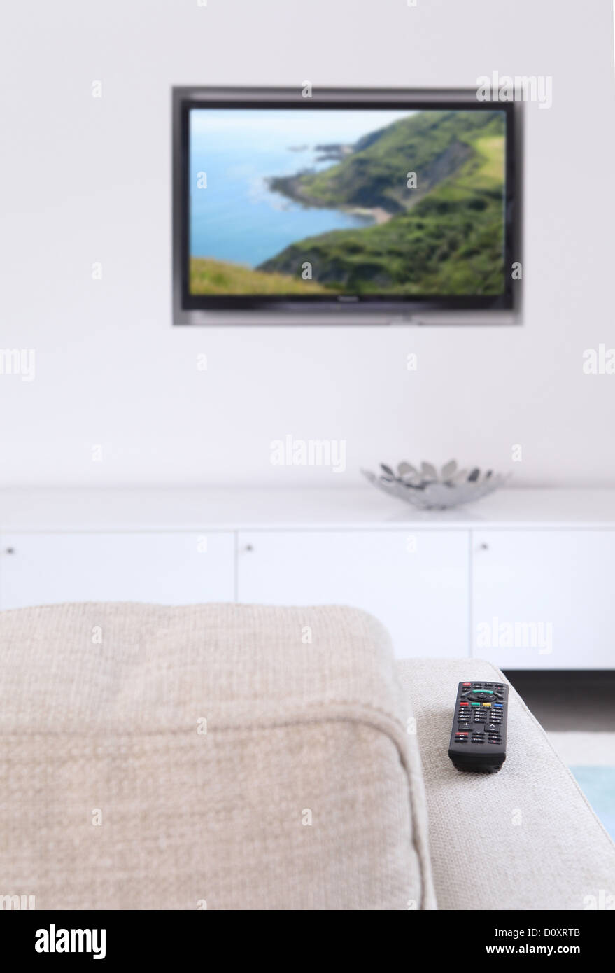 Living room with television and sofa Stock Photo - Alamy