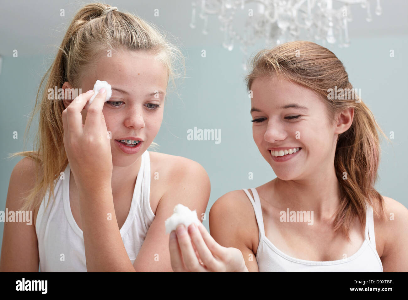Teenage girls cleansing Stock Photo - Alamy