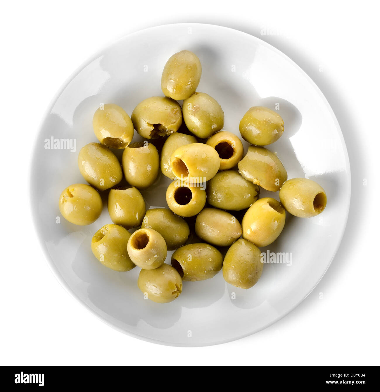 Olives in a plate isolated on a white background Stock Photo - Alamy