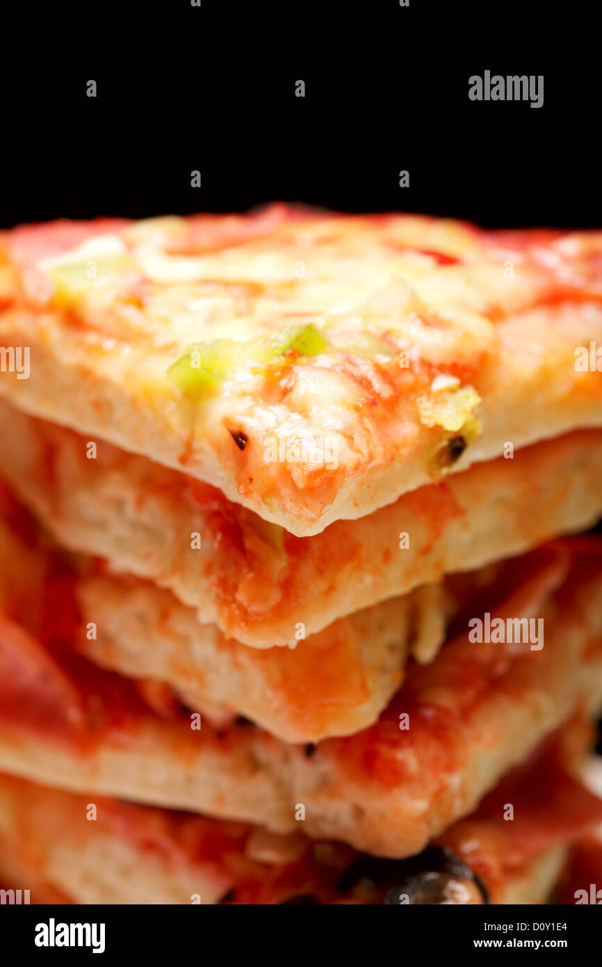 Stacked pizza closeup Stock Photo - Alamy