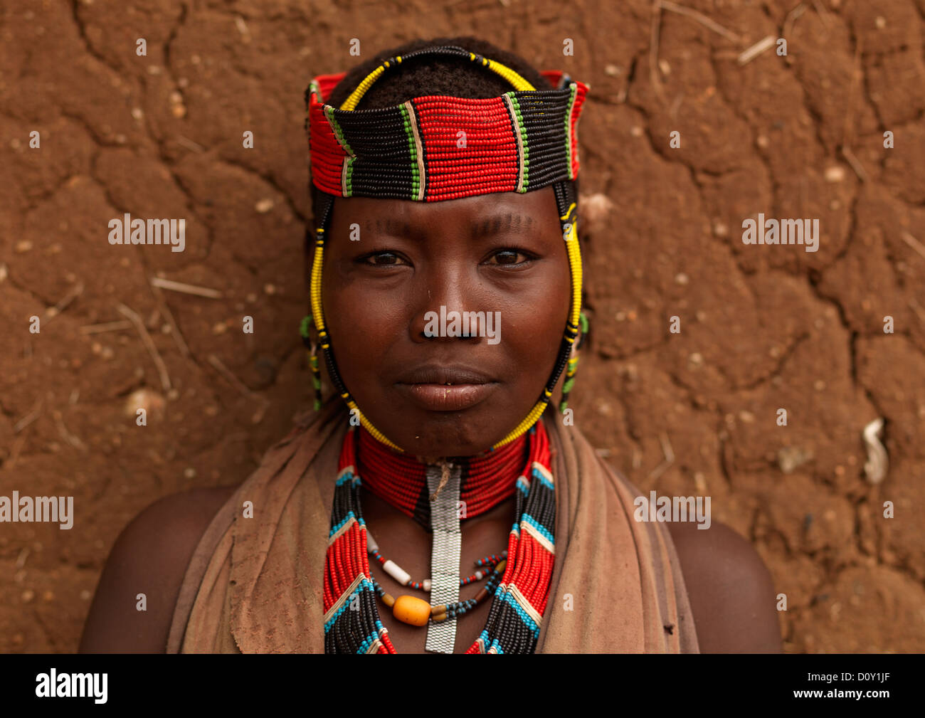 Portrait Of A Hamar Tribe Woman With Colourful Headband And Necklaces ...