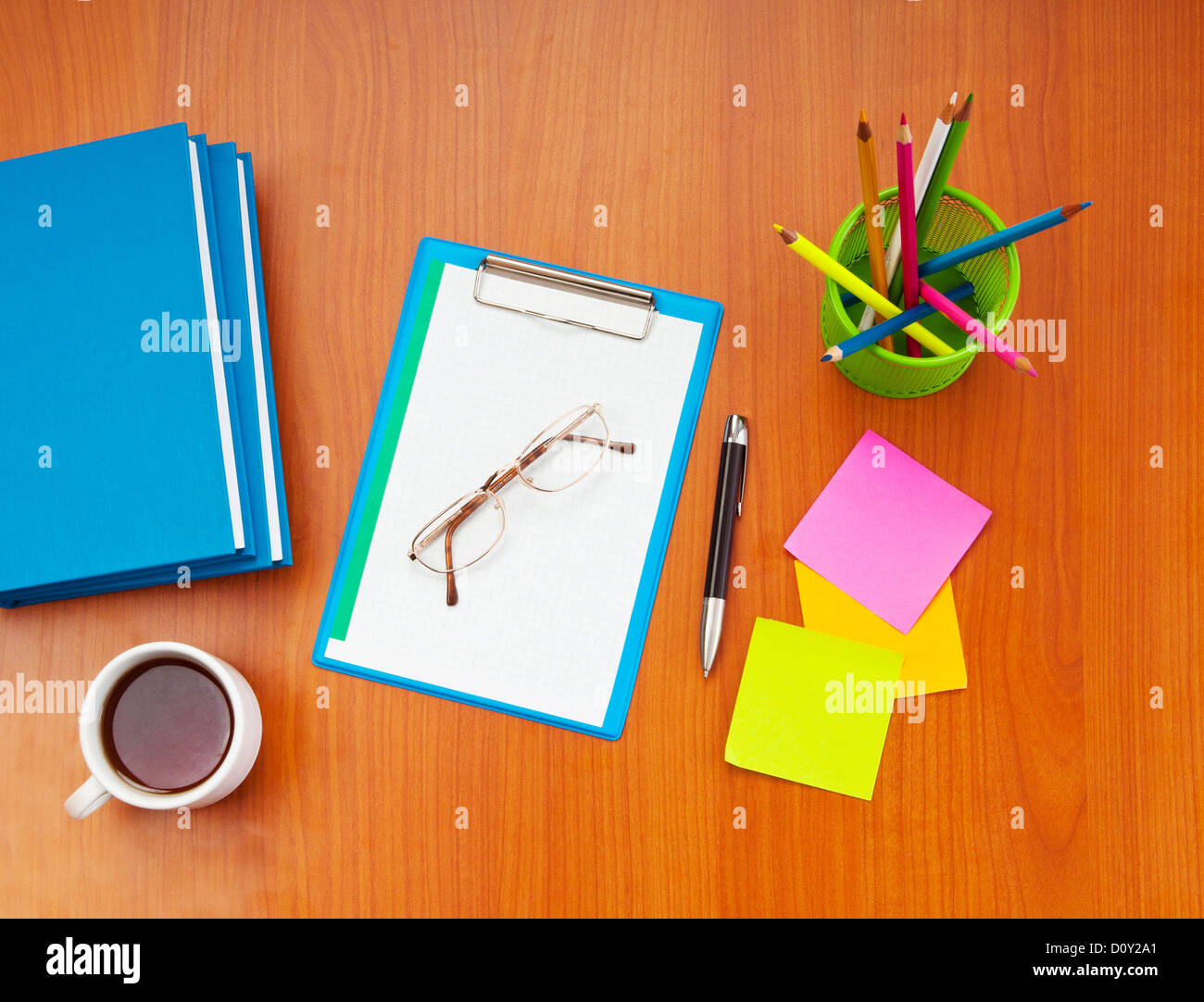 Desk top with many items Stock Photo - Alamy