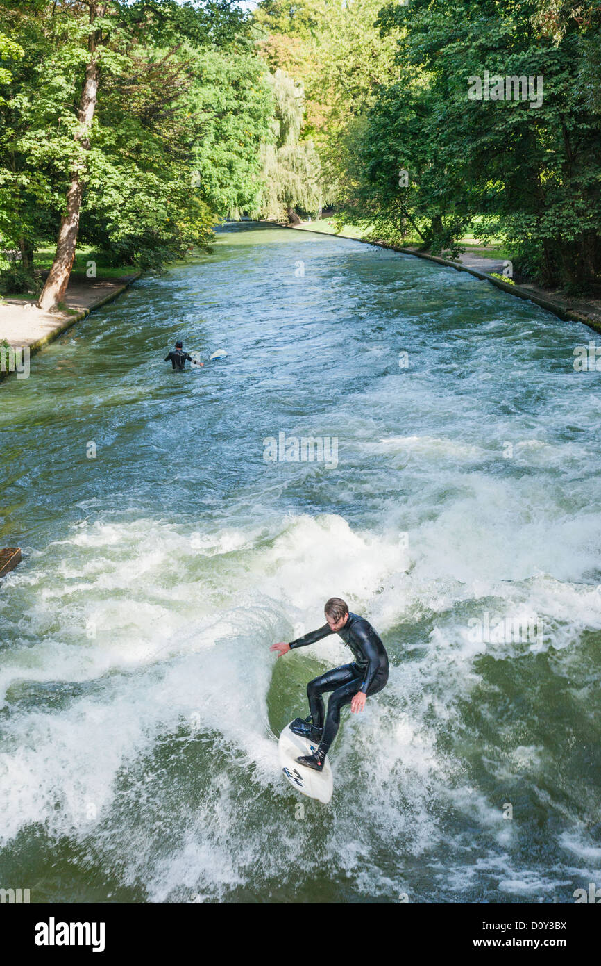 Germany, Bavaria, Munich, English Garden, Surfer on the Eisbach Wave ...