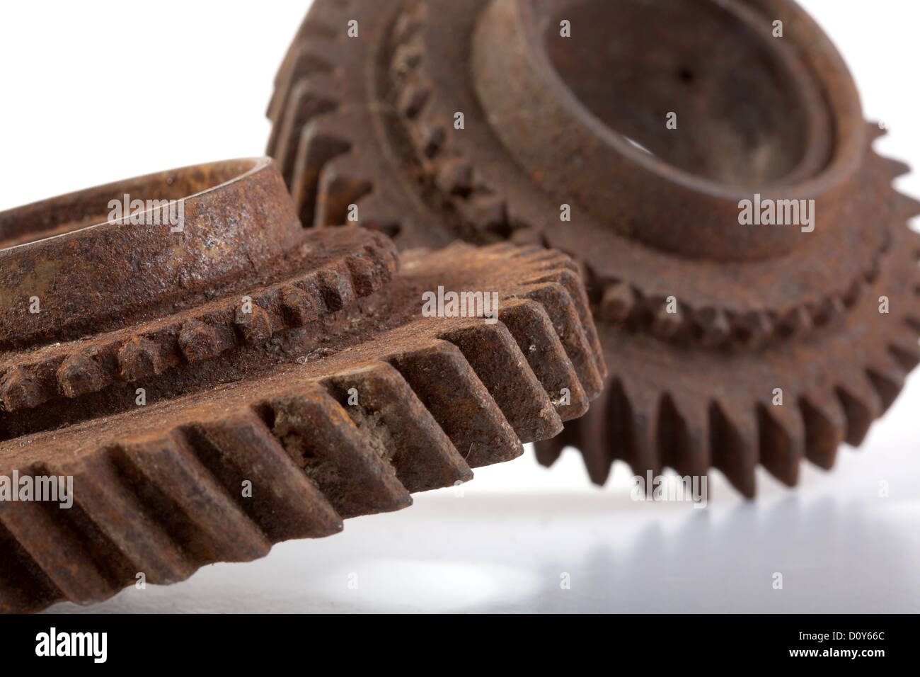 Rusty gears on a white background Stock Photo - Alamy