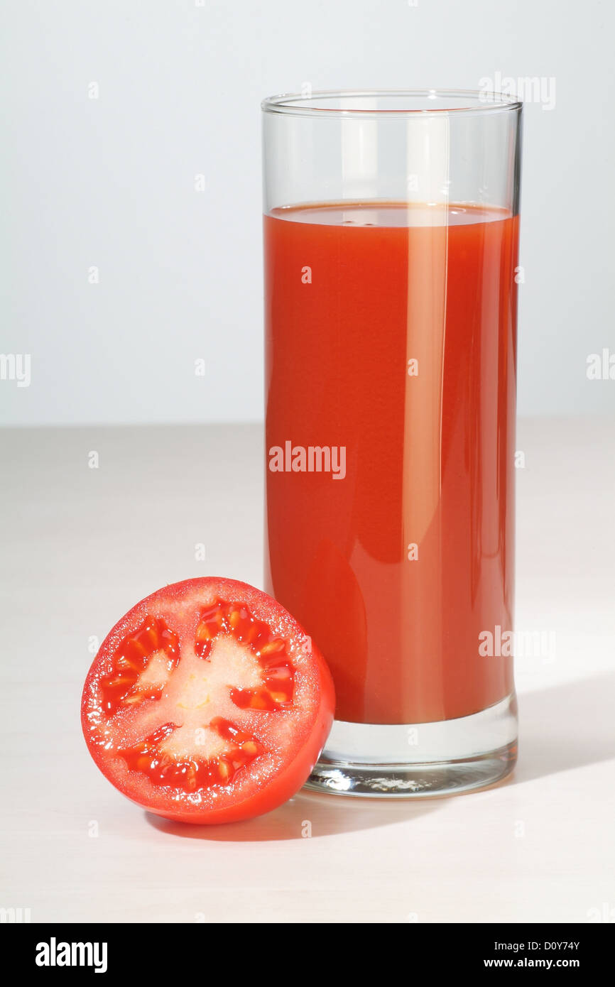 Glass half full juice hi-res stock photography and images - Alamy