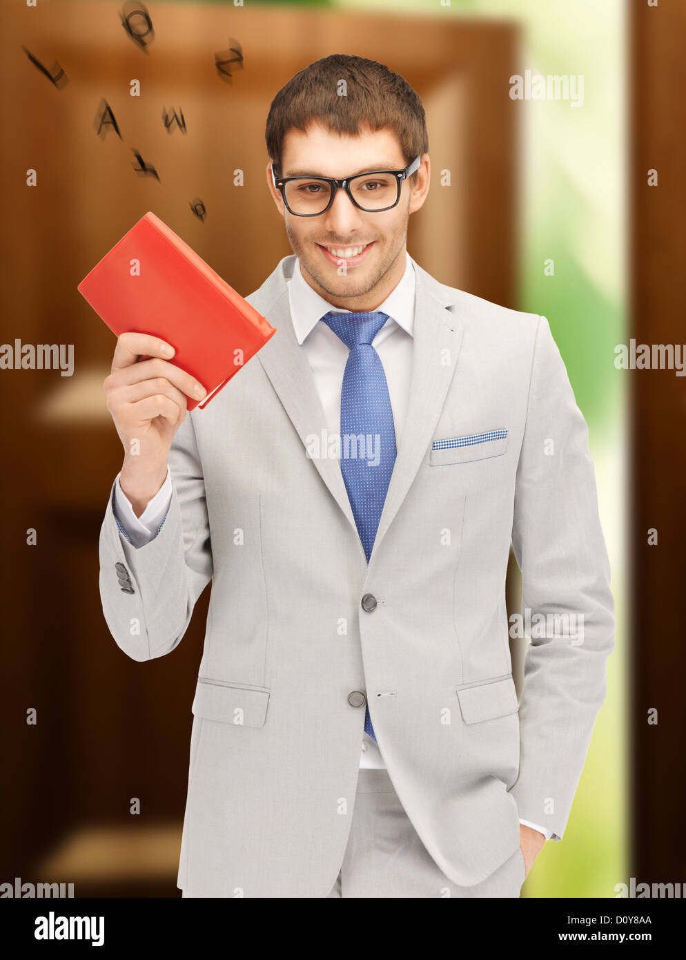 happy man with book Stock Photo - Alamy