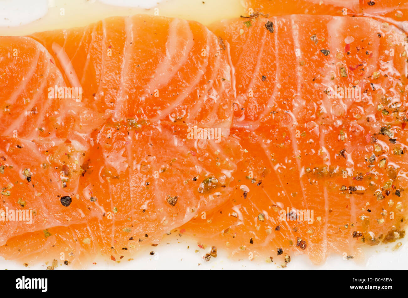 Fish Carpaccio with salad Stock Photo - Alamy