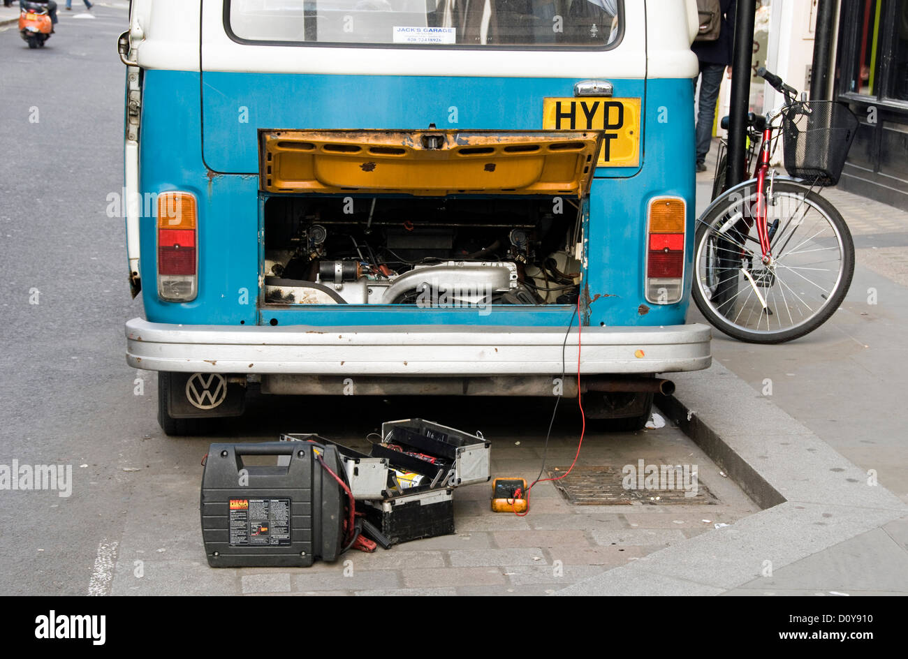 Back engine of Valkswagon camper van open in urban street, London ...
