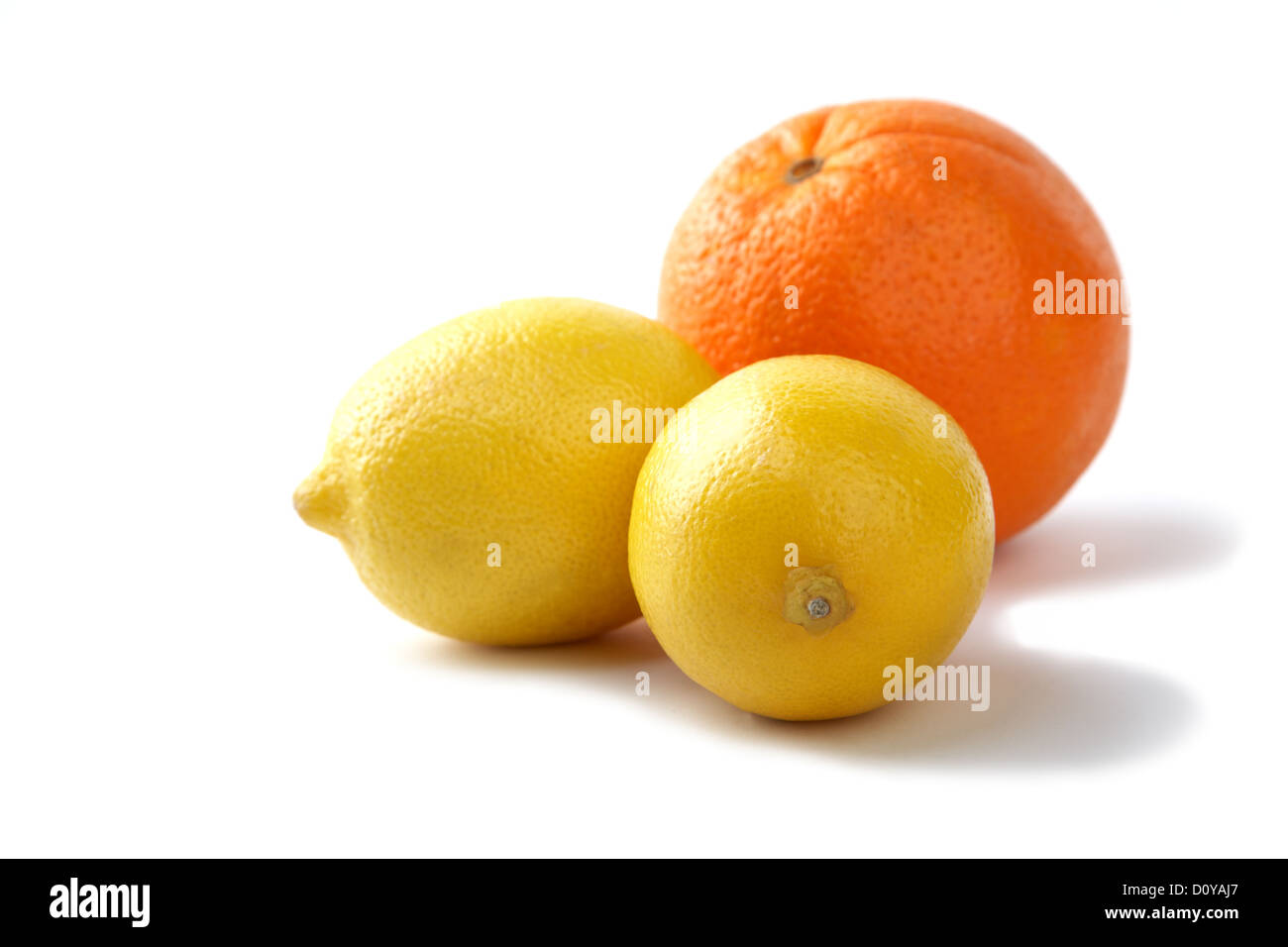 Lemons and orange Stock Photo - Alamy