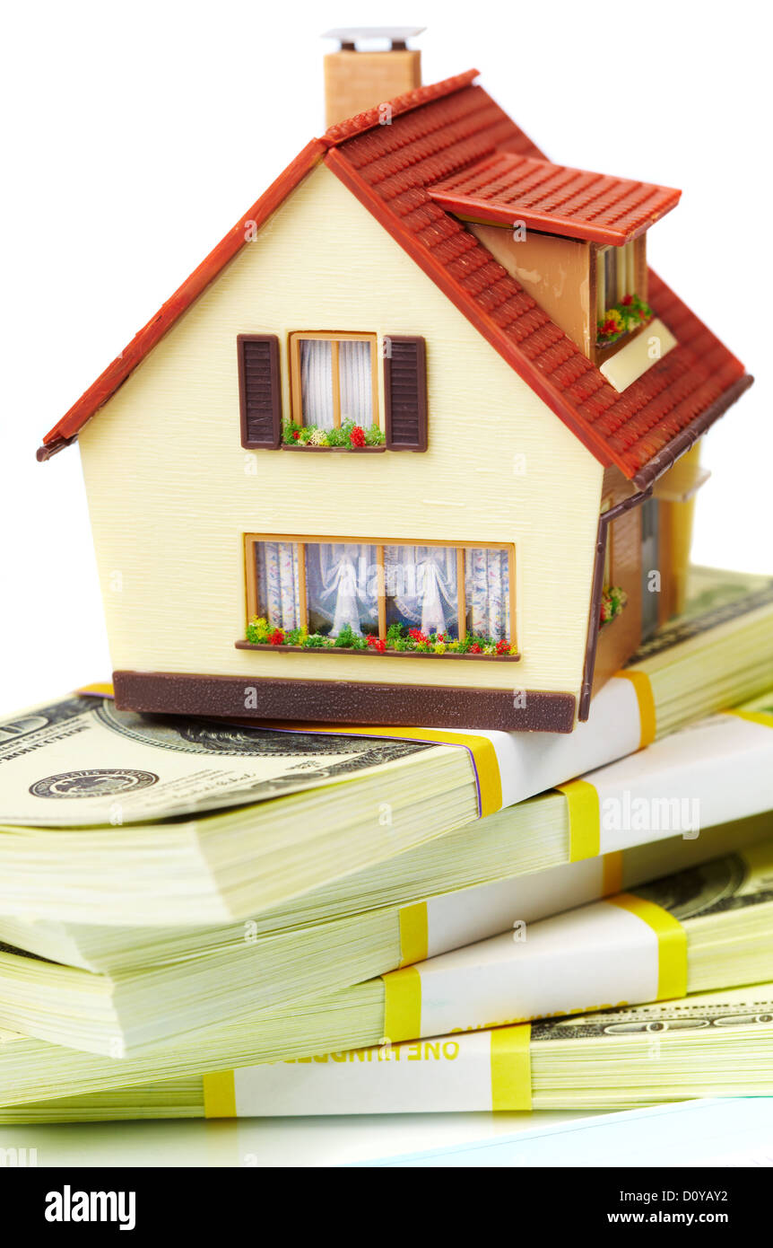 house on packs of banknotes Stock Photo - Alamy