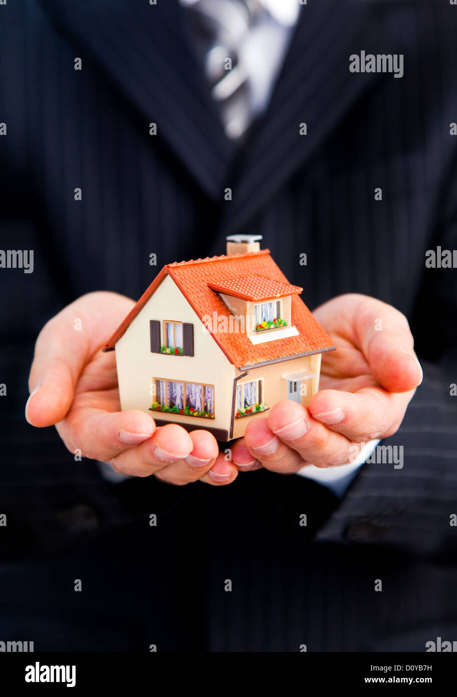 house in a hand Stock Photo - Alamy