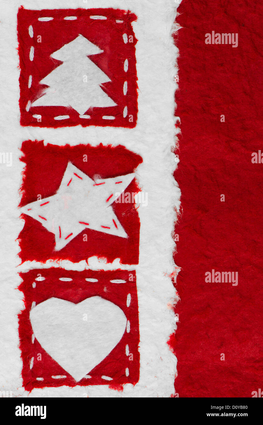 Ripped pieces of paper on recycled paper background. Heart, star and ...