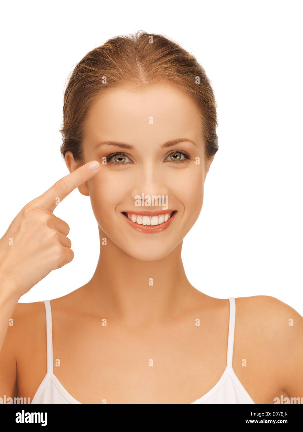 beautiful woman pointing to eye Stock Photo - Alamy