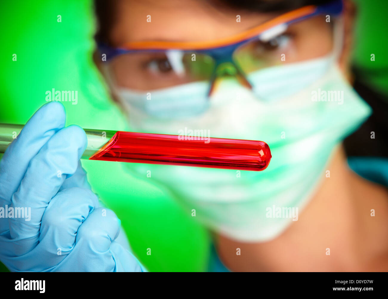 scientist in laboratory with test tubes Stock Photo - Alamy