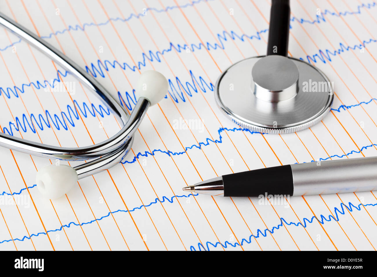 Stethoscope and pen on ecg Stock Photo - Alamy