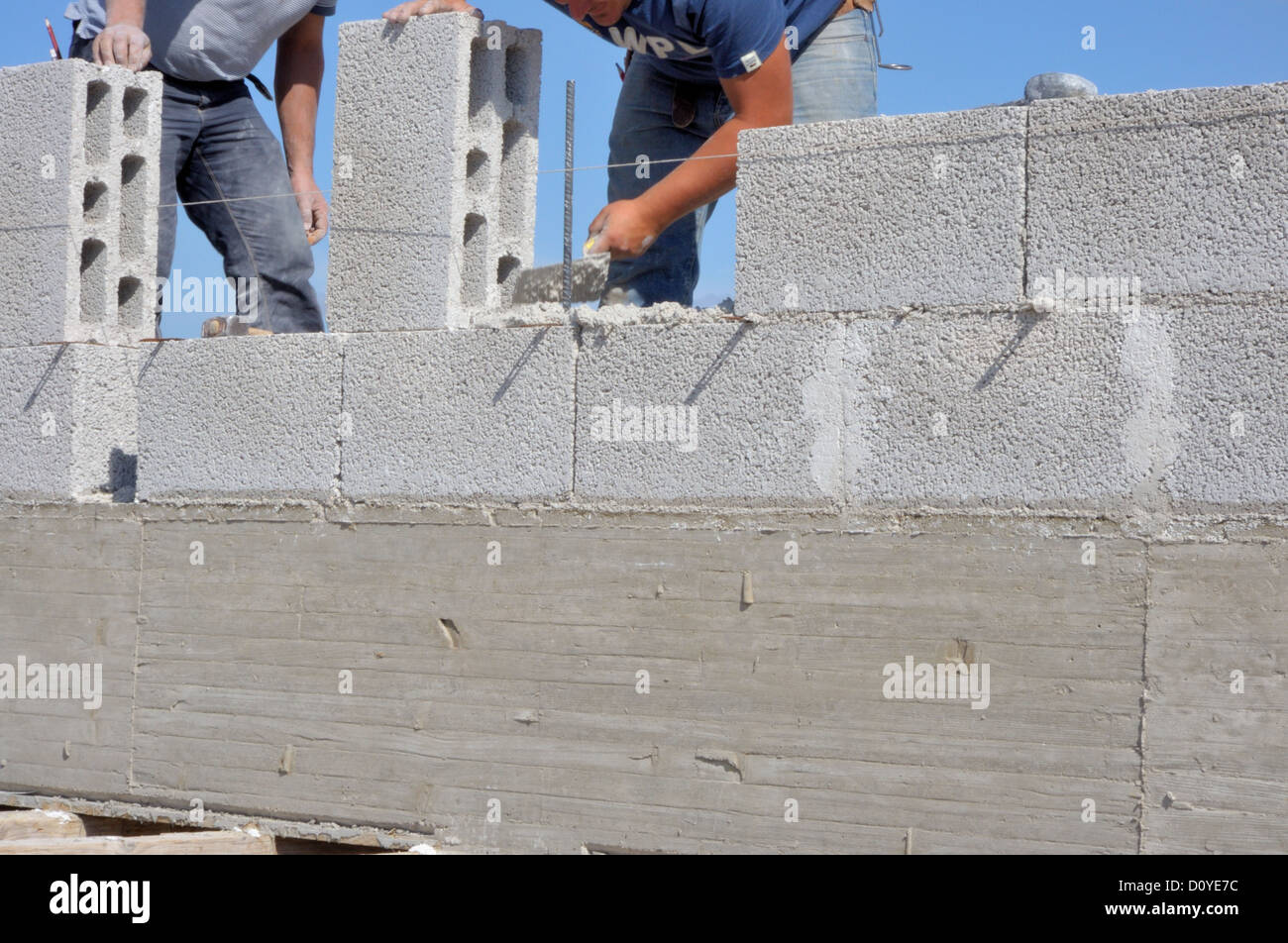 Construction mason worker bricklayer Stock Photo - Alamy