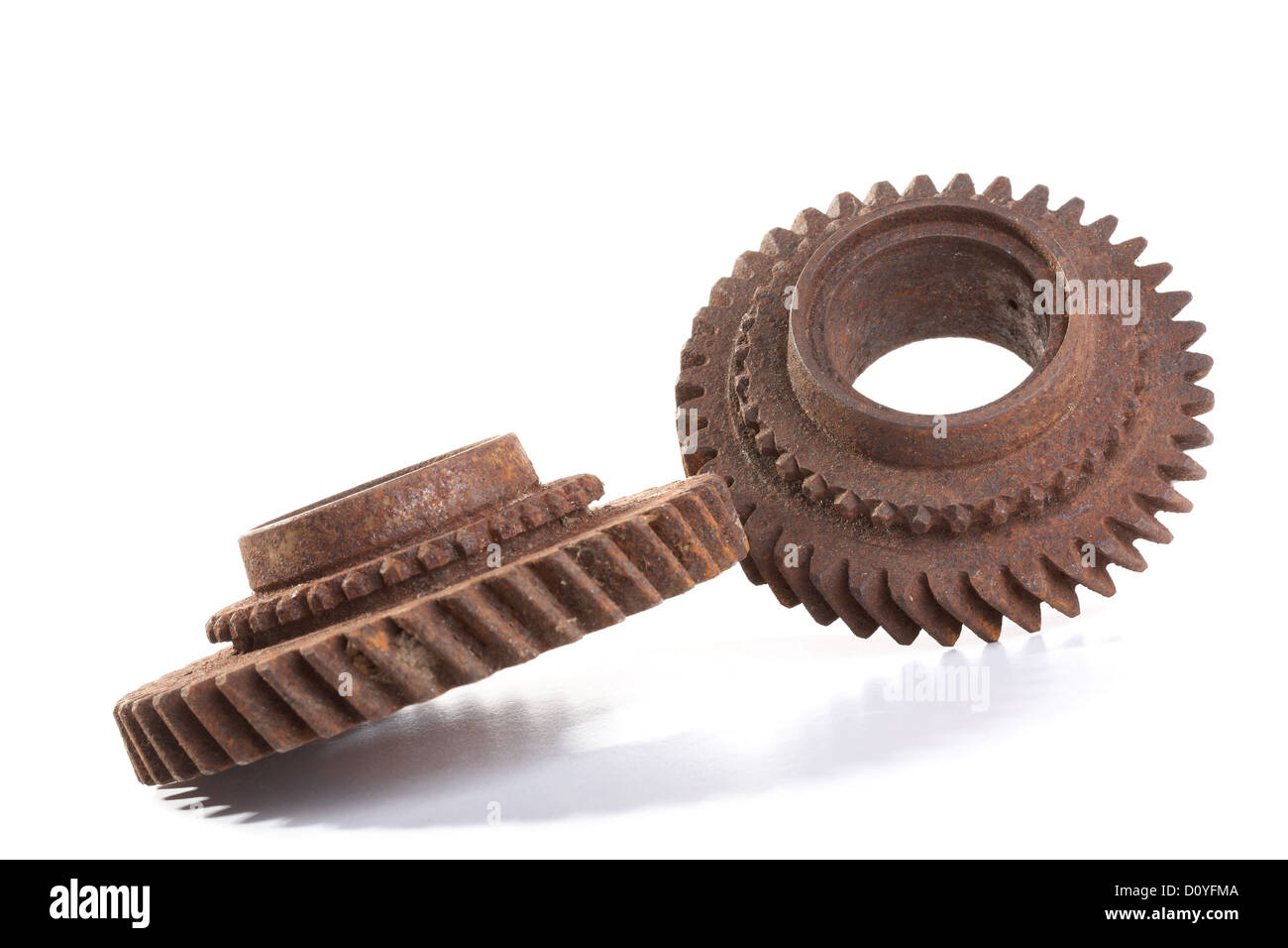 Rusty gears on a white background Stock Photo - Alamy