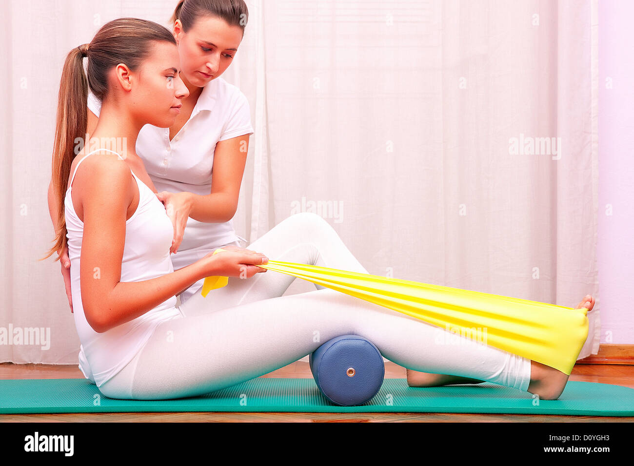 exercises with elastic strengthening tibial tarsal Stock Photo - Alamy