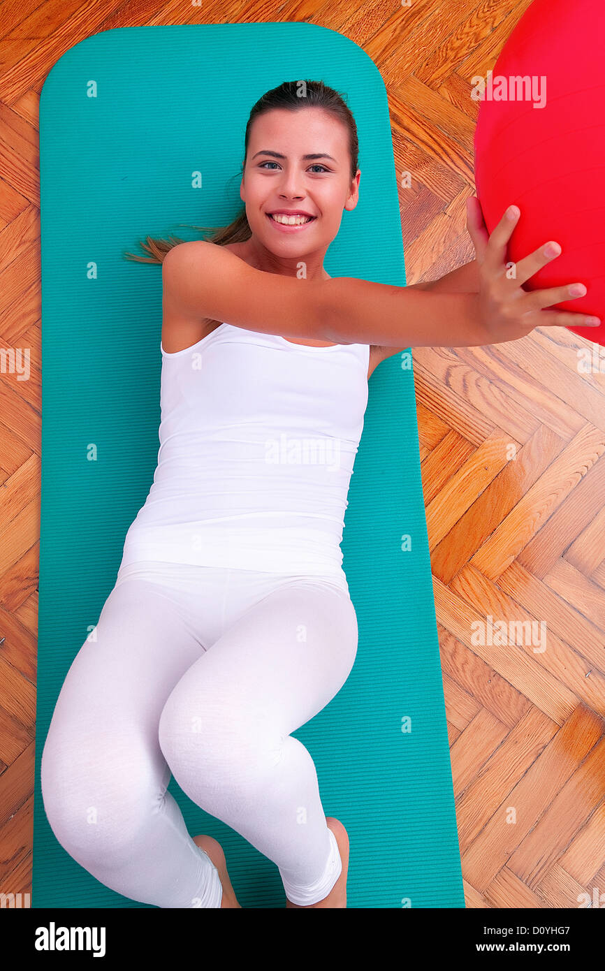 physiotherapy exercises with bobath ball fitball Stock Photo - Alamy