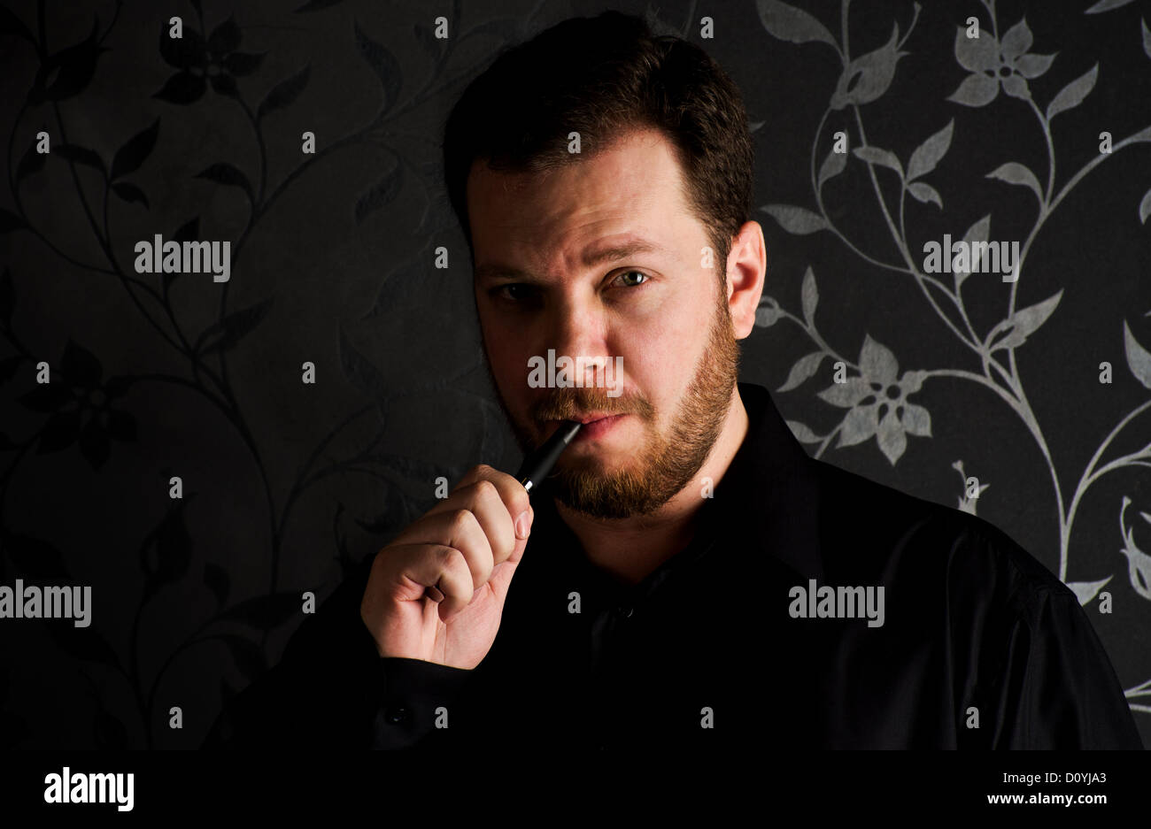 Smoking pose hi-res stock photography and images - Alamy