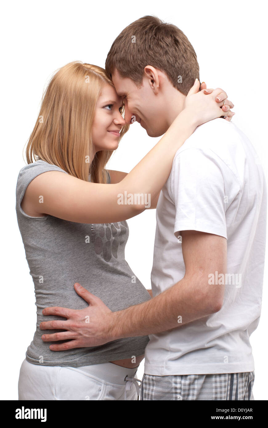 Young pregnant couple Stock Photo - Alamy
