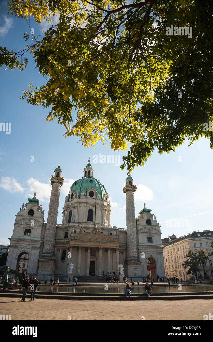 Vienna's Baroque Karlskirche, with its columns, domes and reflective ...