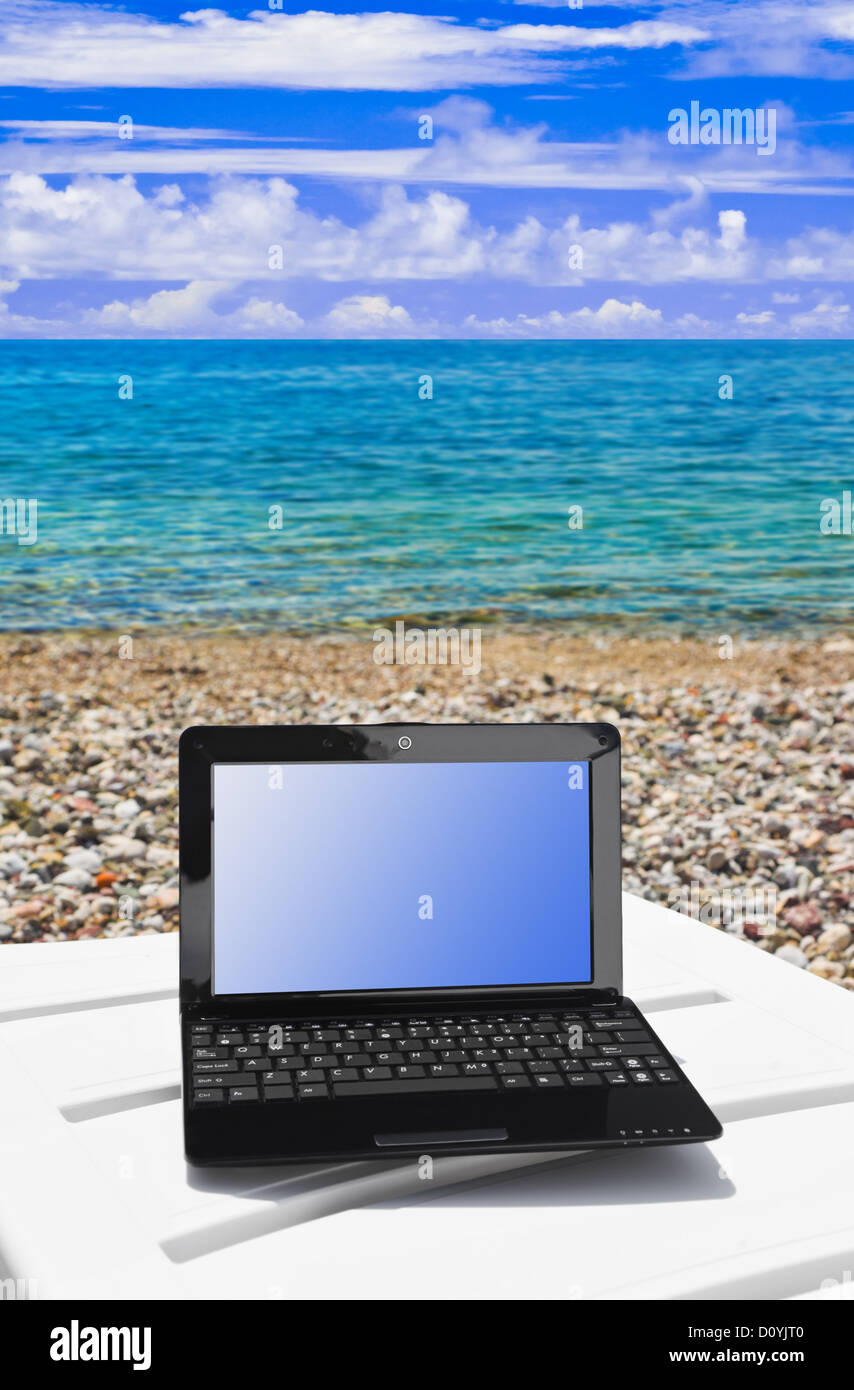 Notebook on beach Stock Photo - Alamy