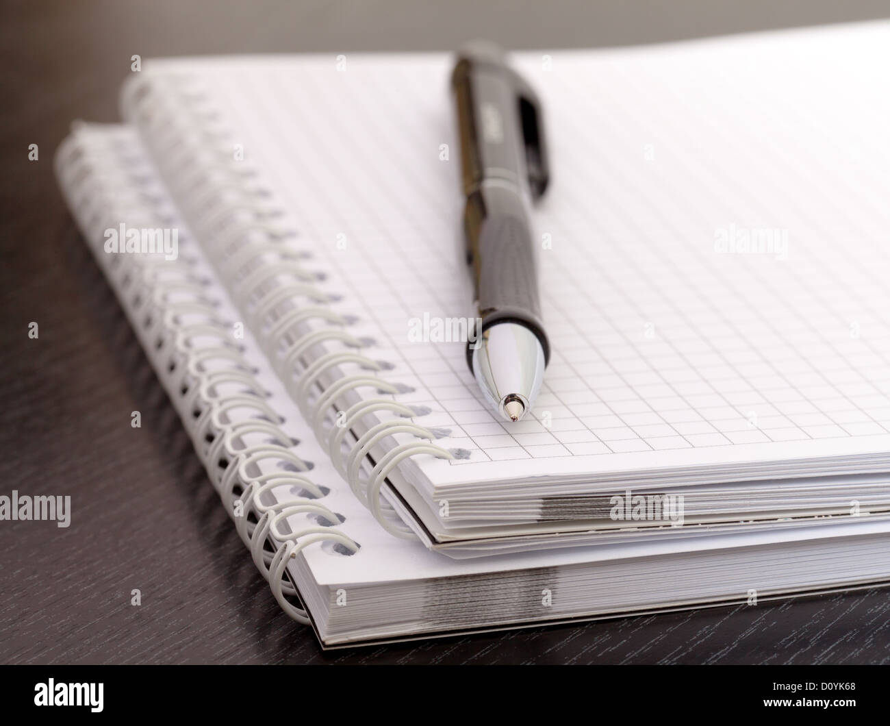 black pen and notebook Stock Photo - Alamy