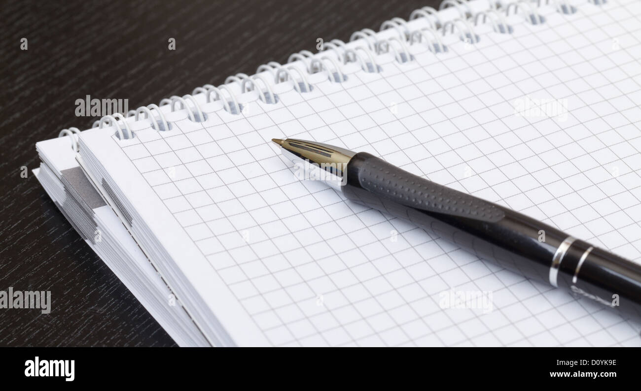 black pen and notebook Stock Photo - Alamy