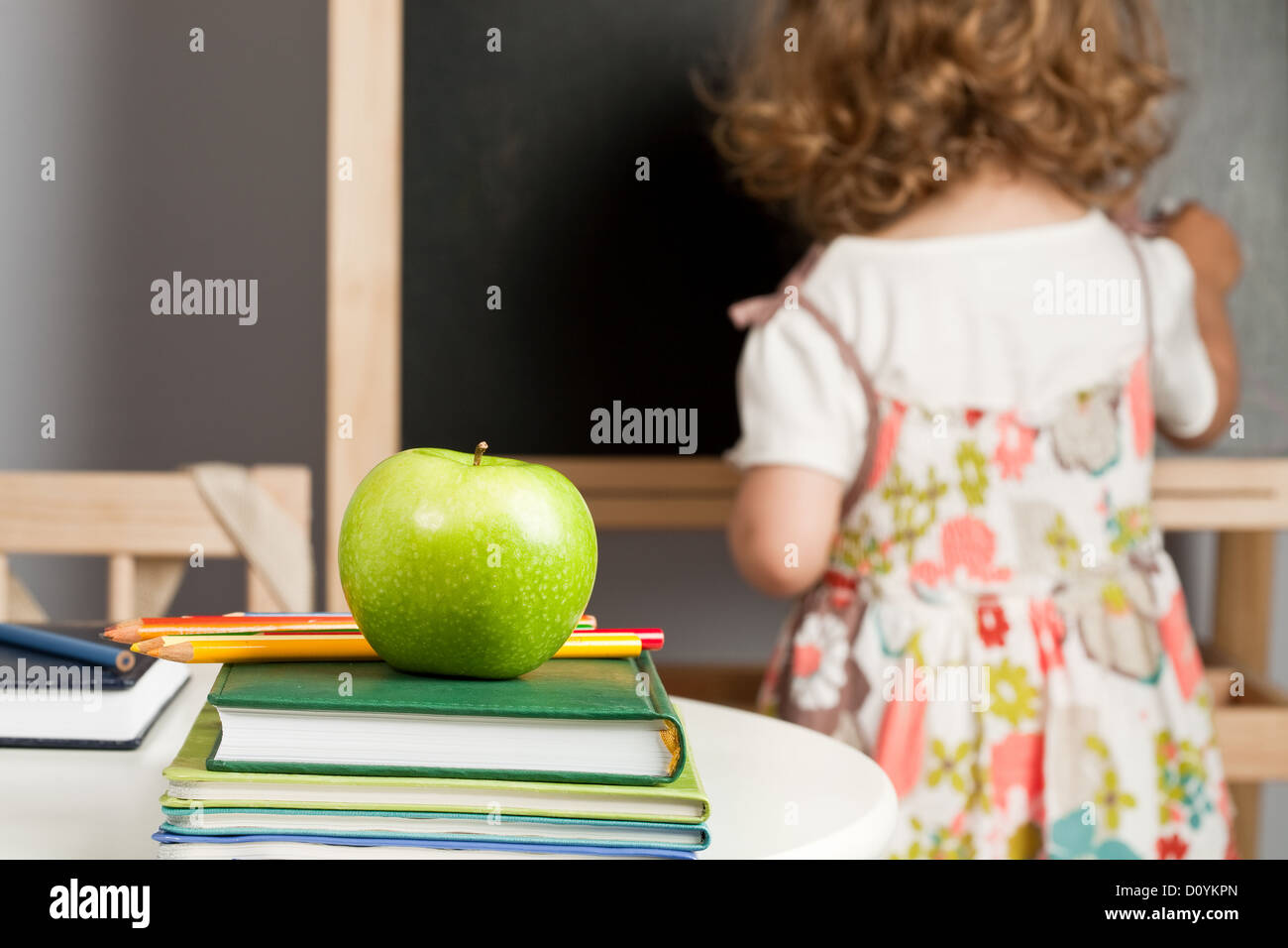 Schoolchild in classroom Stock Photo - Alamy