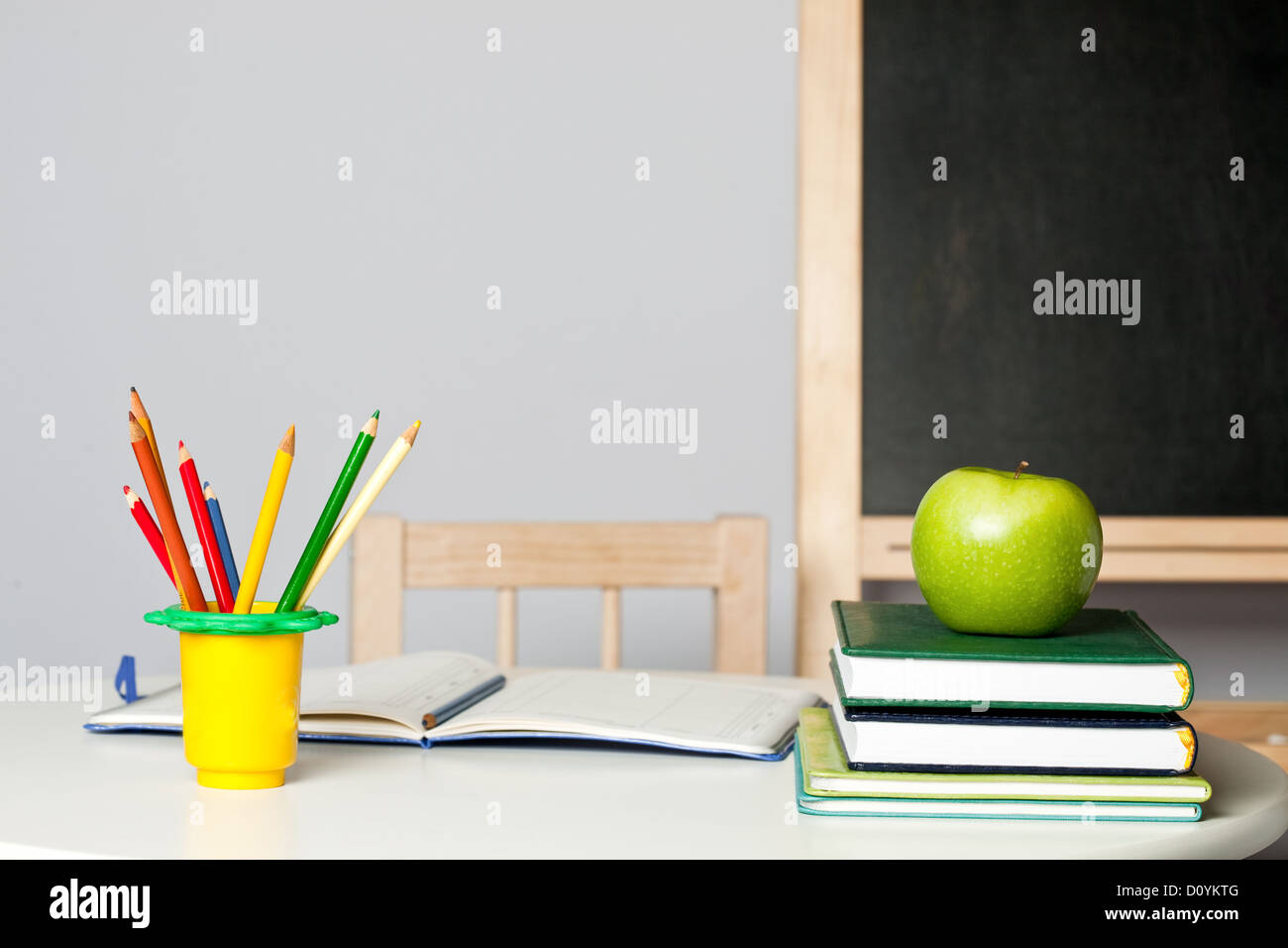 Desk in classroom Stock Photo - Alamy