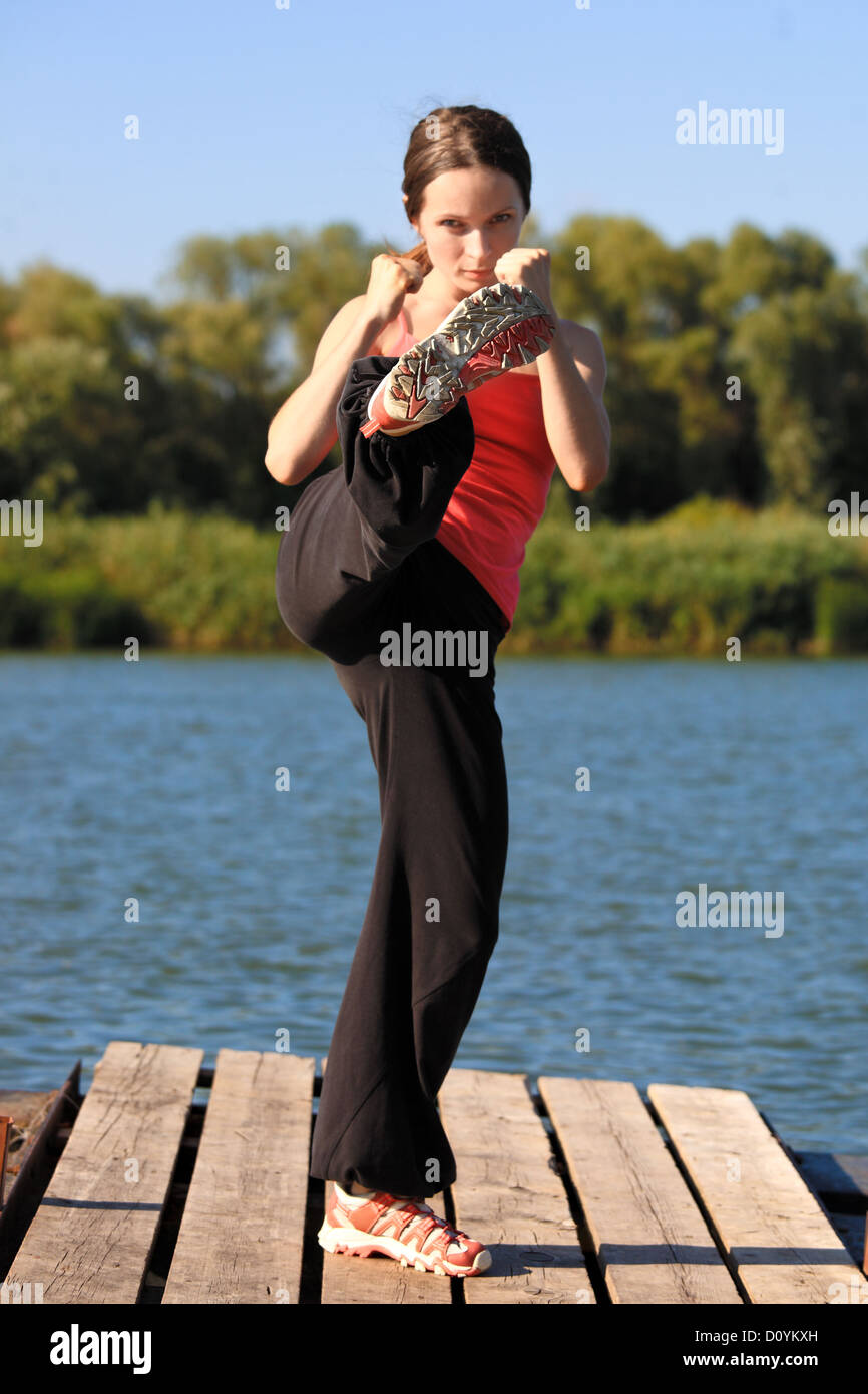 Kick boxing woman Stock Photo - Alamy