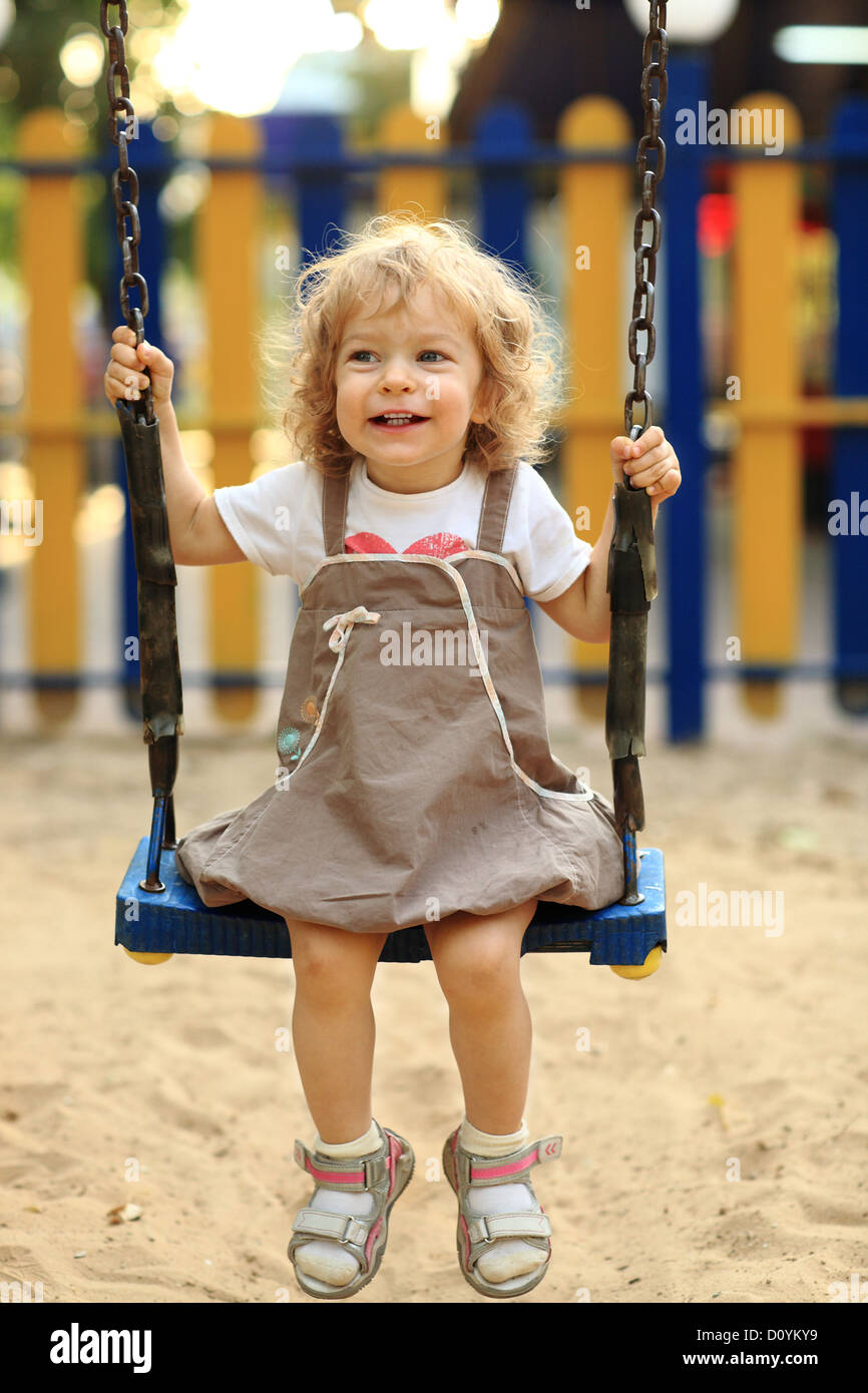 Child on swing Stock Photo - Alamy