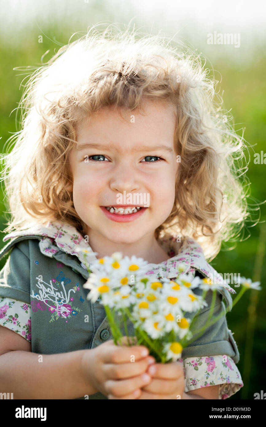 Happy child spring daisy hi-res stock photography and images - Alamy