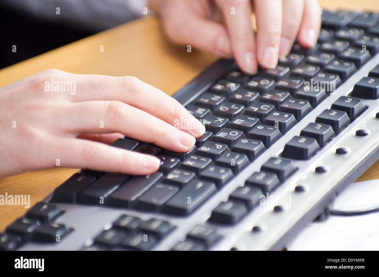 Working on the computer keyboard Stock Photo - Alamy