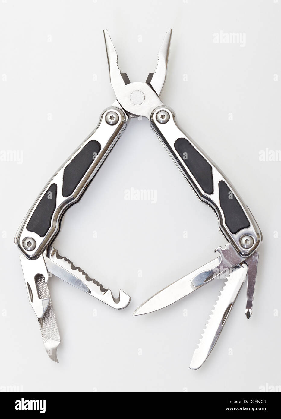 Steel pliers folding multi tool opened Stock Photo - Alamy