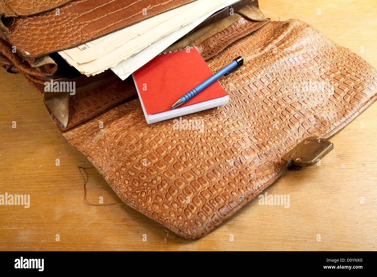 Old portfolio from a crocodile leather Stock Photo - Alamy