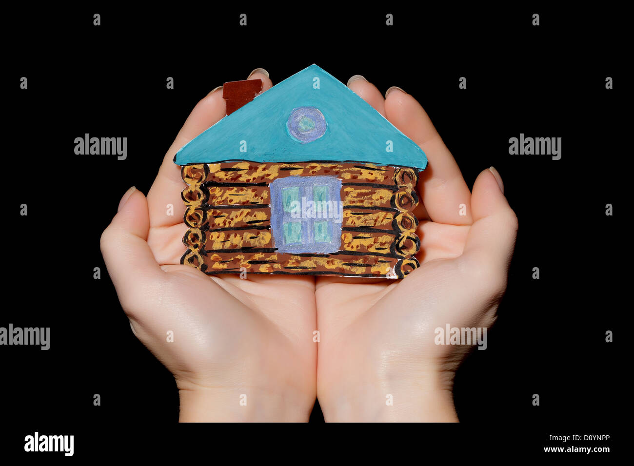 painted house in hands Stock Photo - Alamy