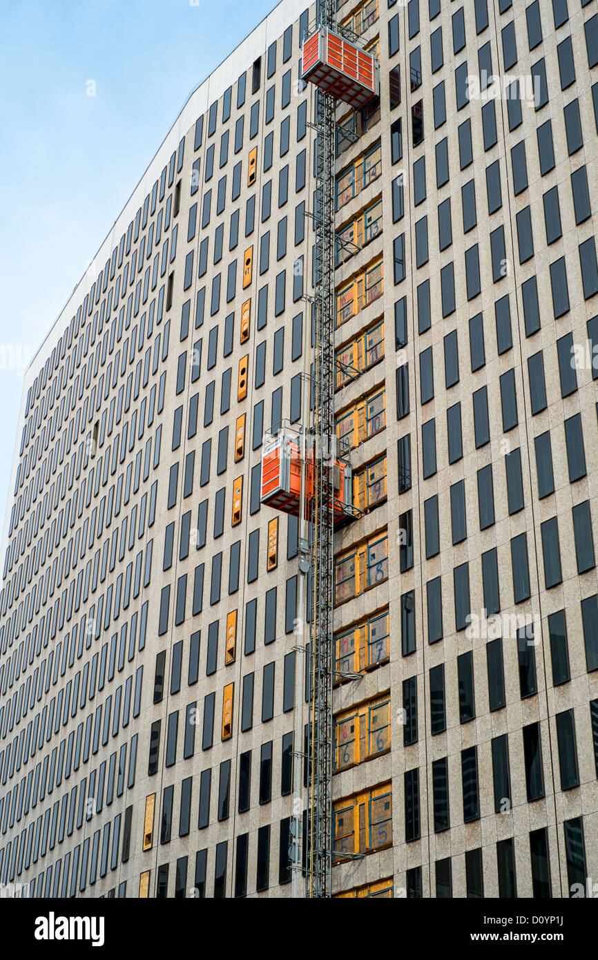 A building undergoing exterior renovation Stock Photo - Alamy
