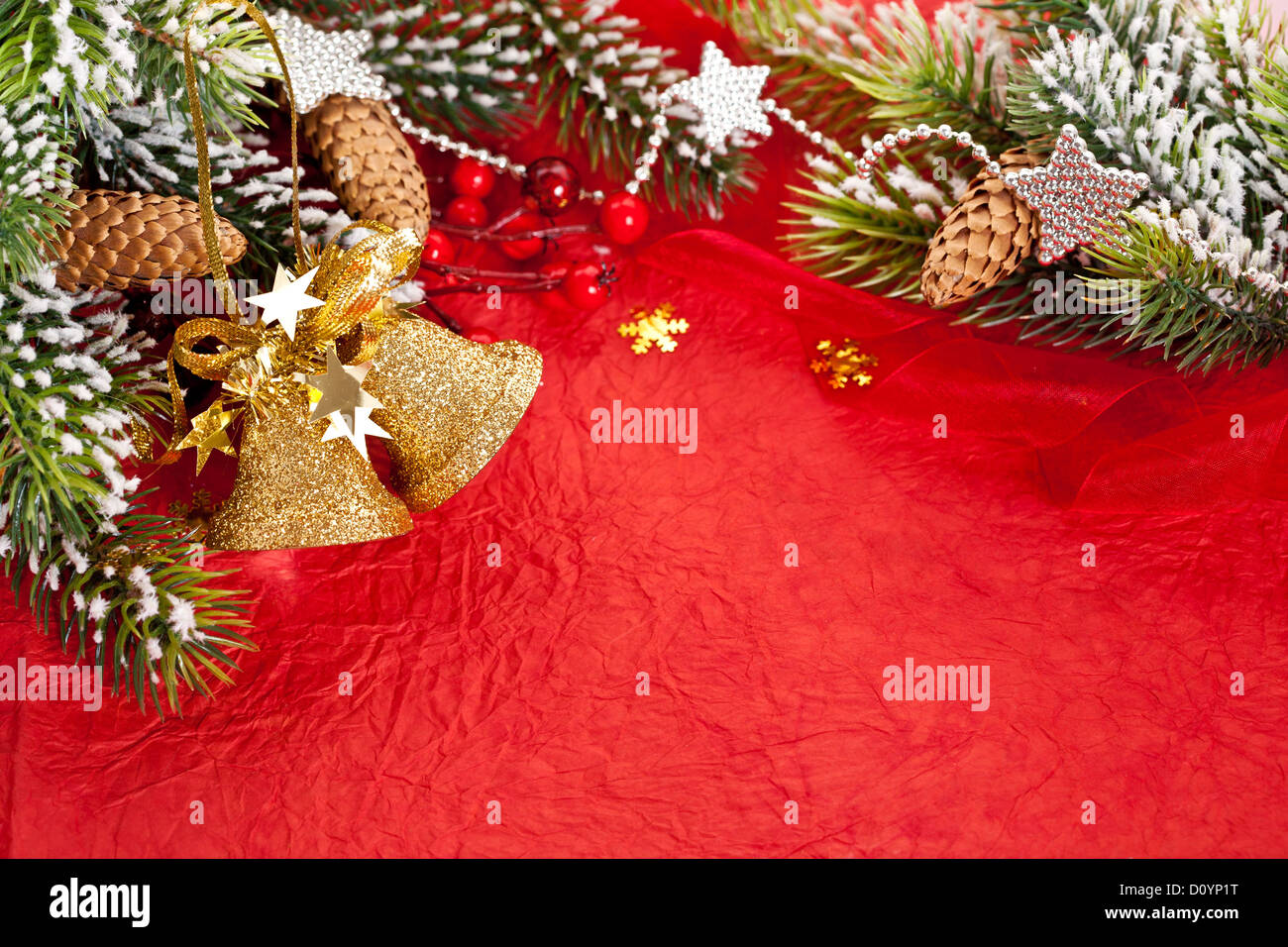 Christmas border from branch and bells Stock Photo - Alamy