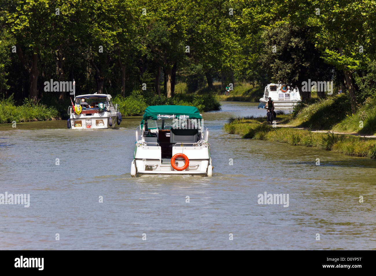 boats float down the river Stock Photo - Alamy