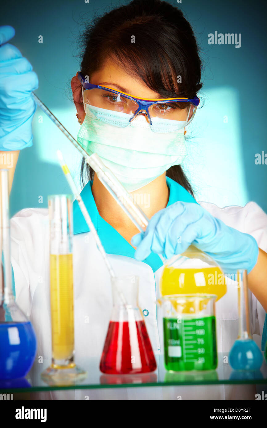 scientist in laboratory with test tubes Stock Photo - Alamy