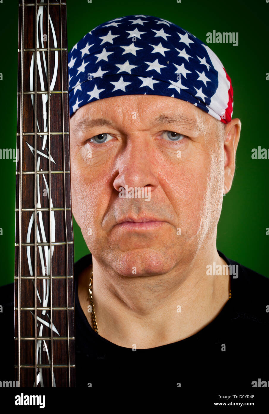 man with a guitar, bass player Stock Photo - Alamy