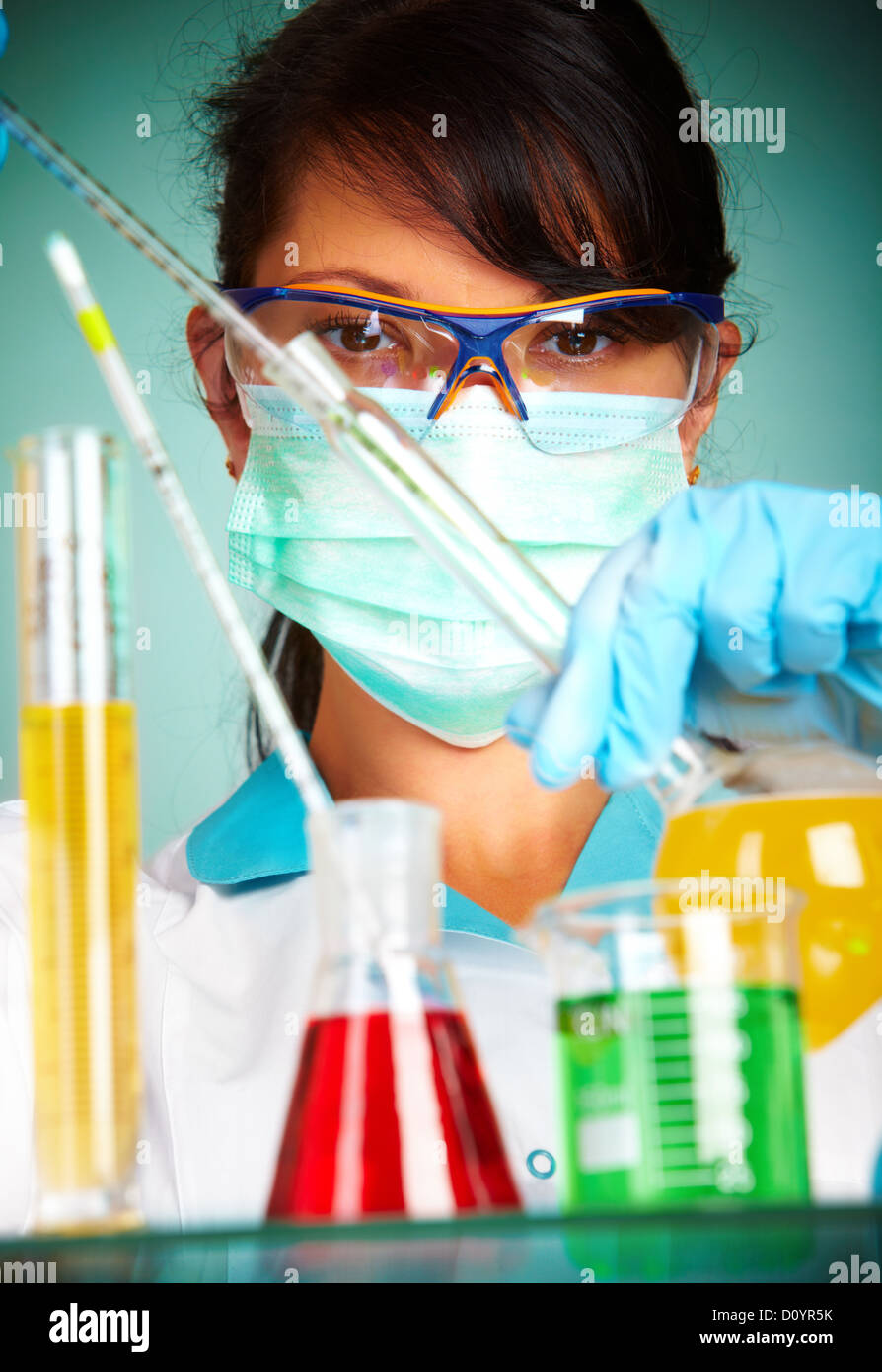 scientist in laboratory with test tubes Stock Photo - Alamy