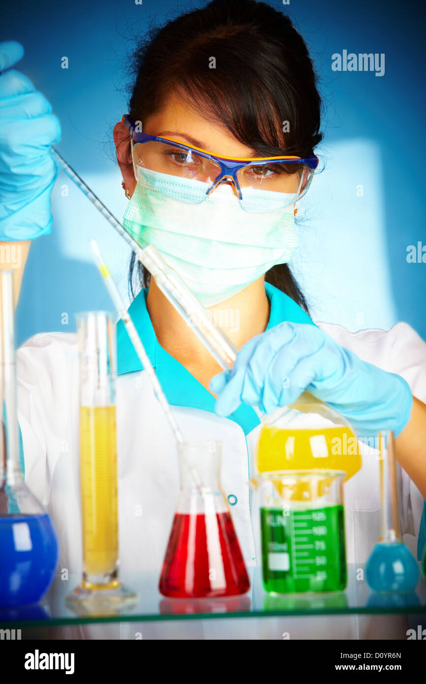 scientist in laboratory with test tubes Stock Photo - Alamy