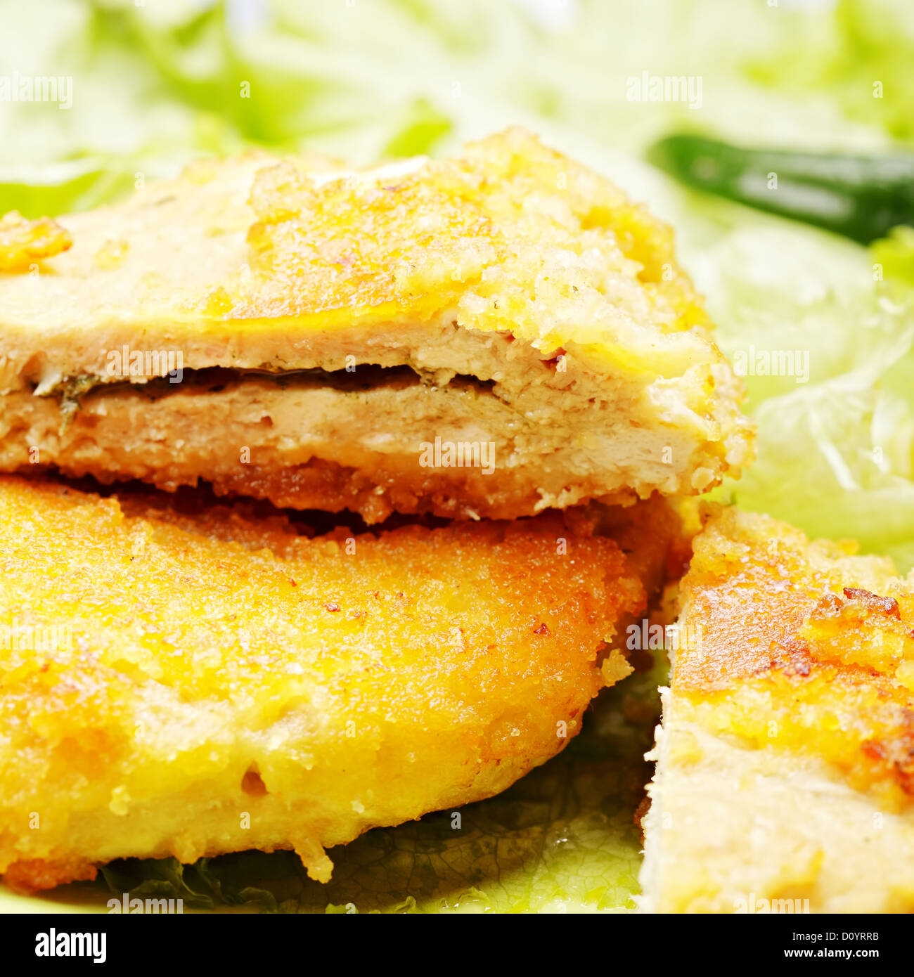 Cut chicken cutlets Stock Photo - Alamy