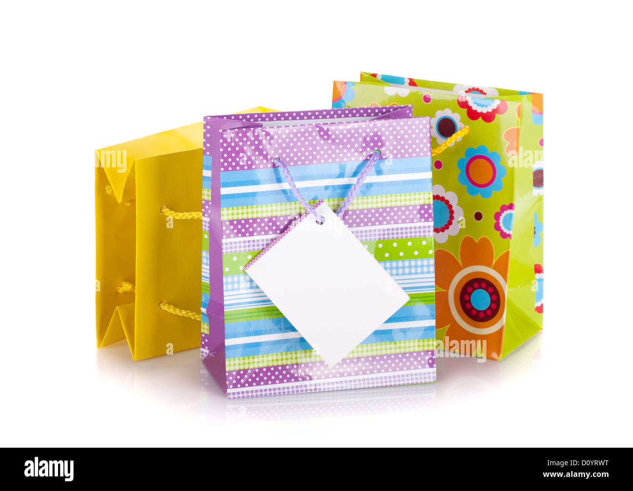Colored gift bags. Isolated on white background Stock Photo - Alamy